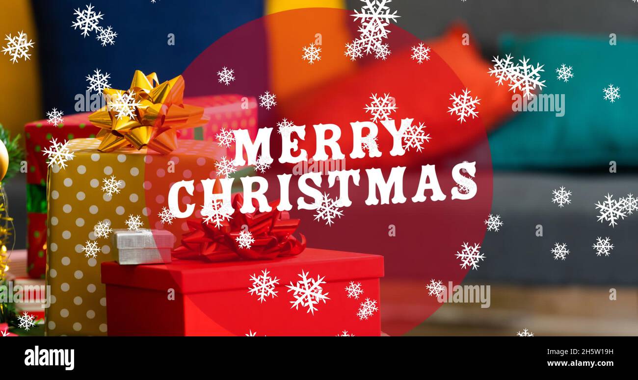 Image of merry christmas text over snow falling and presents Stock ...