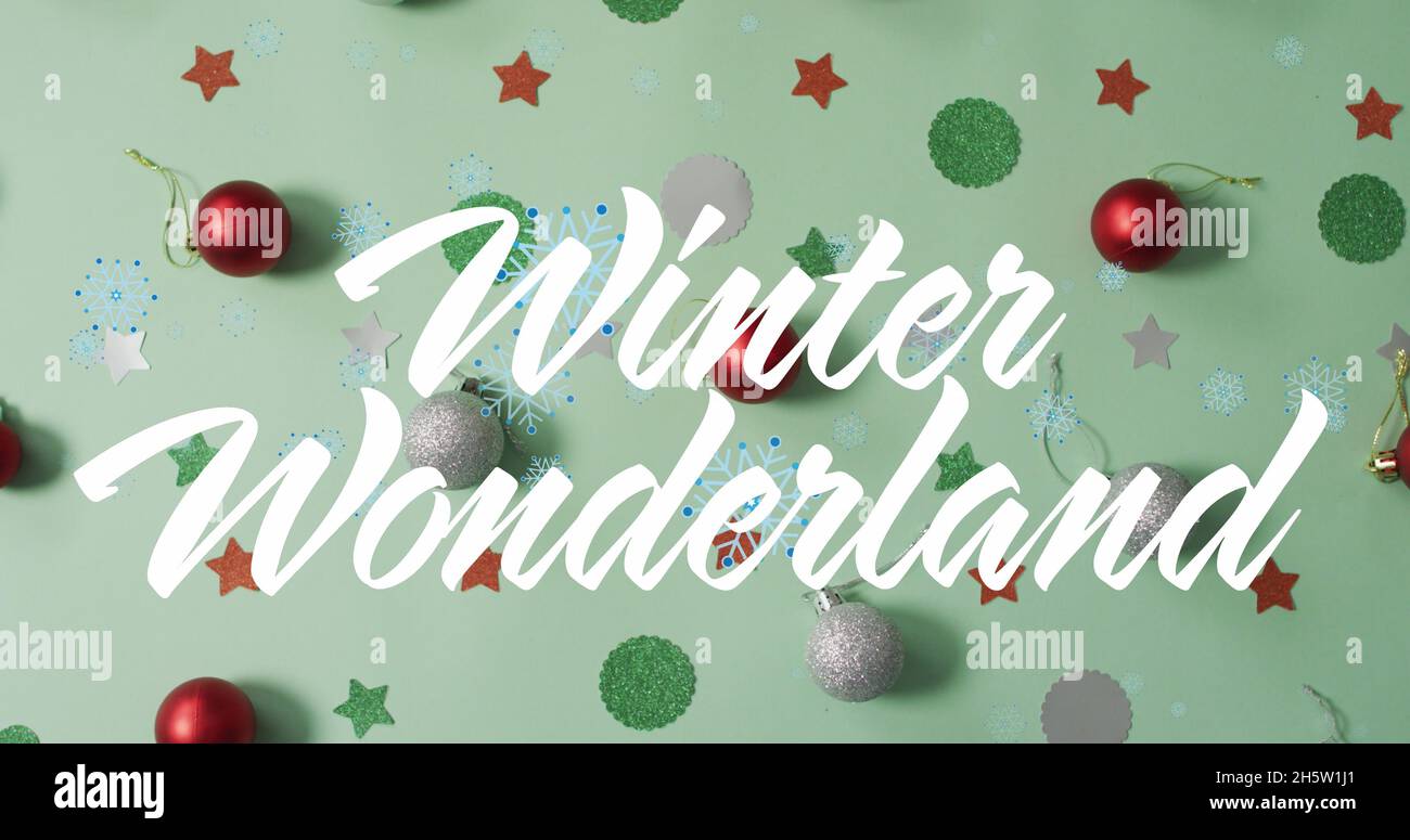 Image of winter wonderland text over christmas decorations Stock Photo ...