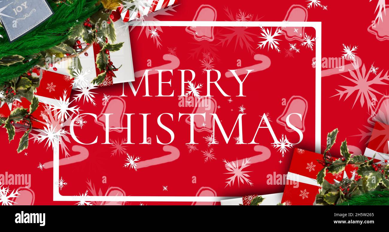 Image of merry christmas text over presents and snow falling Stock ...