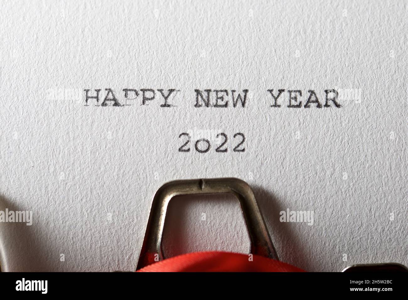 The sentence, Happy New Year 2022, written with a typewriter Stock ...