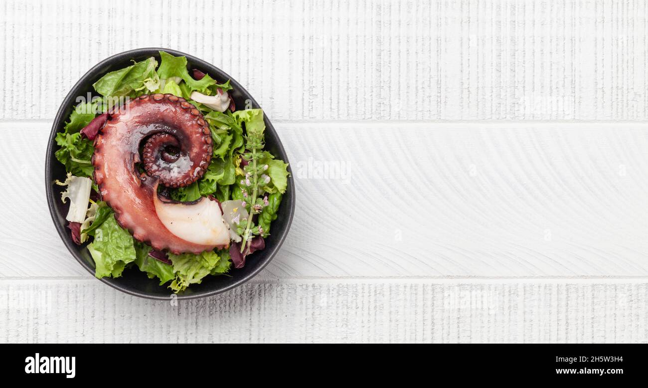 Grilled octopus with salad. Top view flat lay with copy space Stock ...