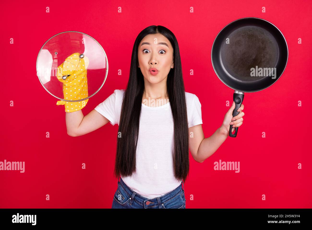 Photo of funny excited housewife lady hold new pan omg reaction wear ...