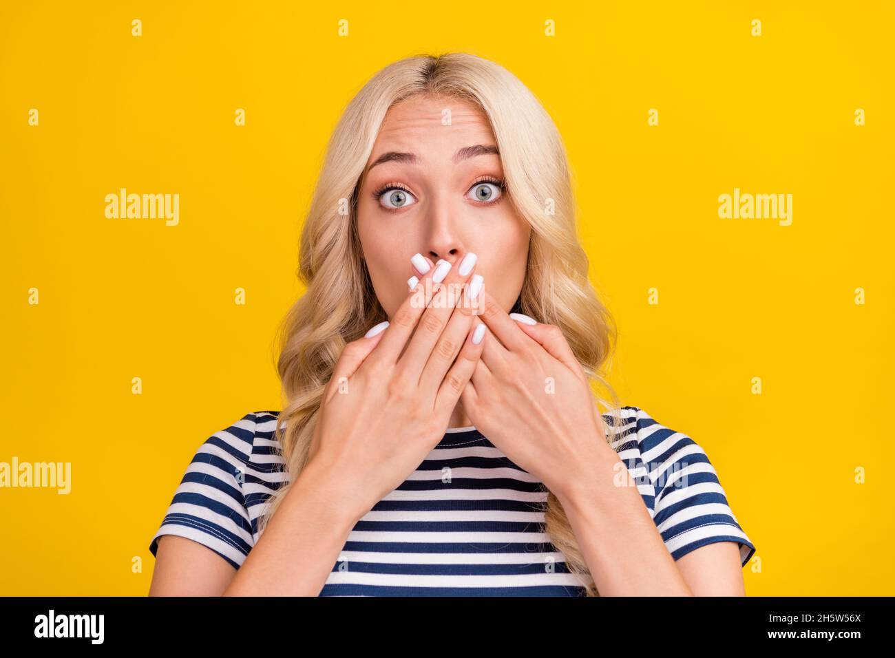 Portrait of attractive worried puzzled confused girl closing mouth ...