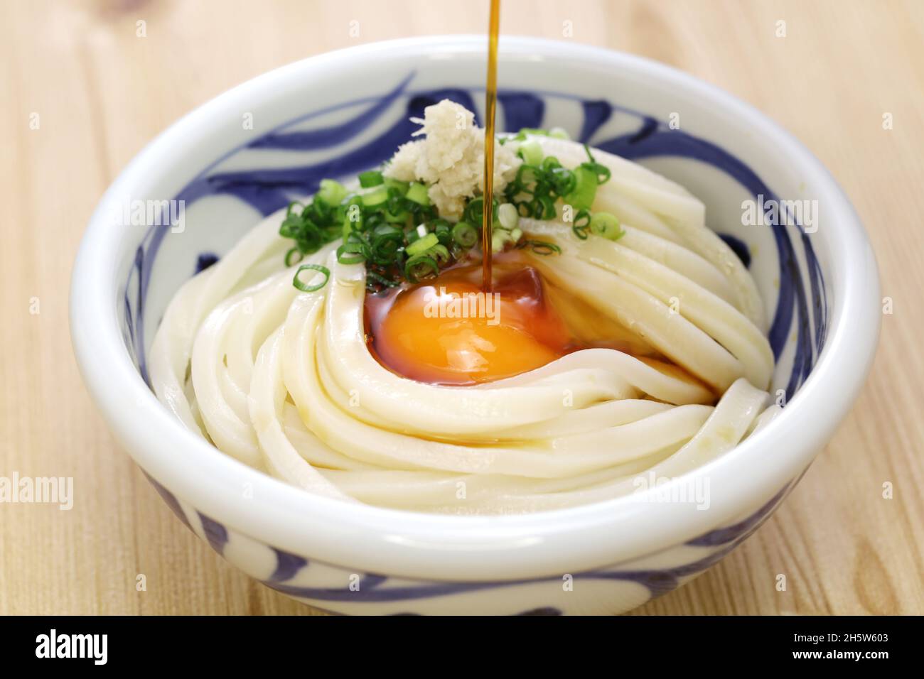 Kamatama Udon, hot udon noodles with raw egg and soy sauce. Japanese ...