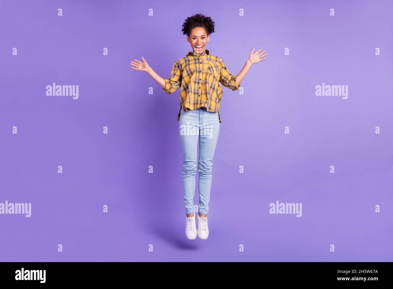 Full body photo of young african girl happy positive smile jumper wave ...