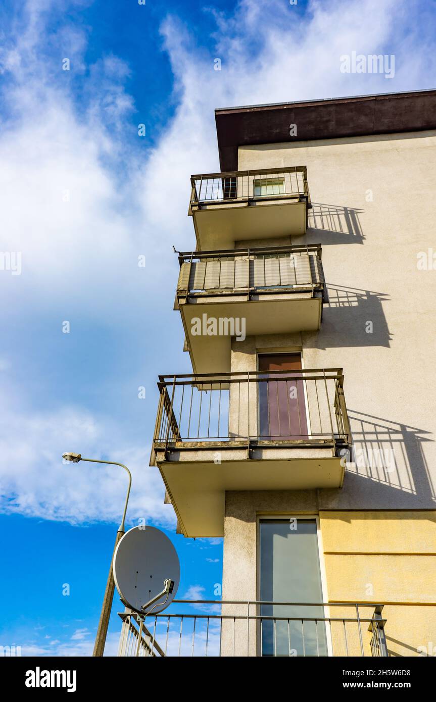 POZNAN, POLAND - Jul 10, 2018: A vertical low angle of an apartment ...
