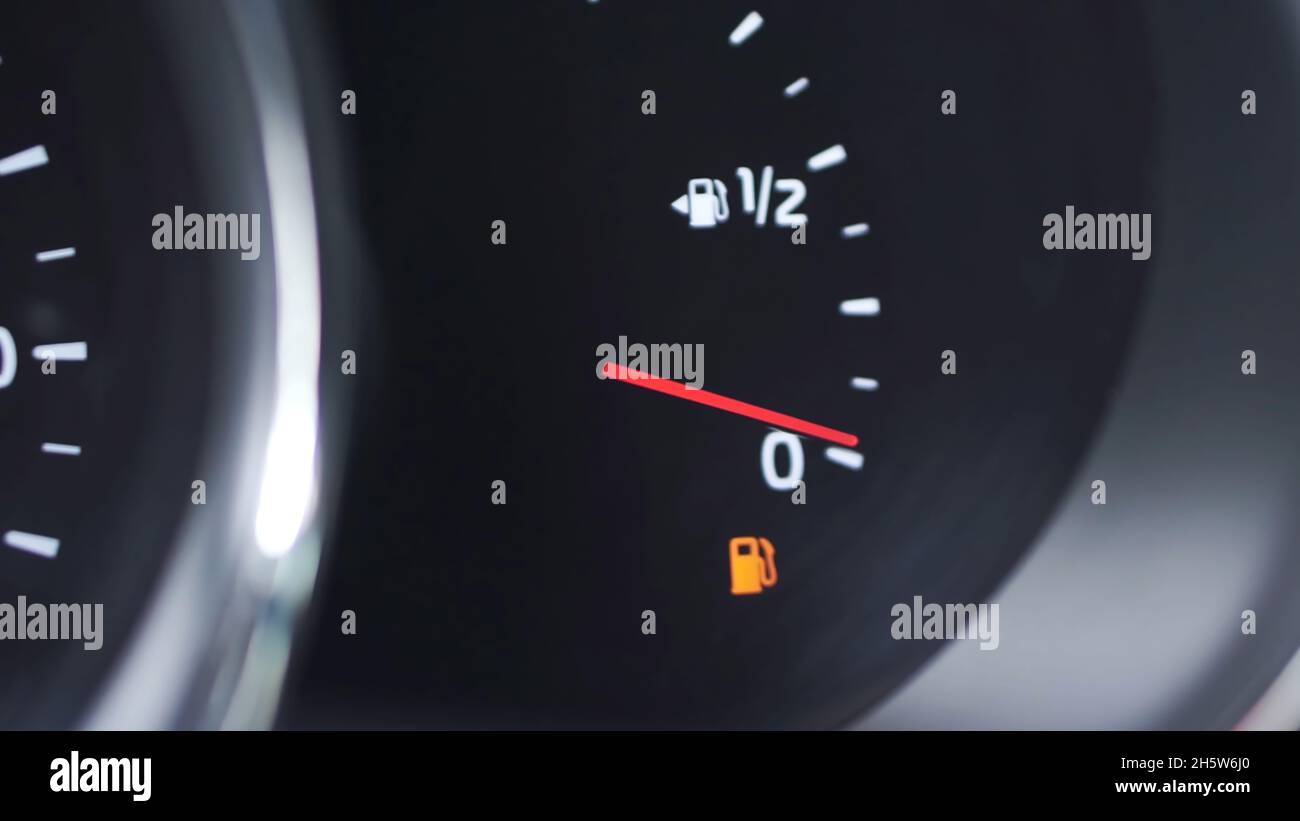 Close-up car dash board petrol meter, fuel gauge, with over full ...