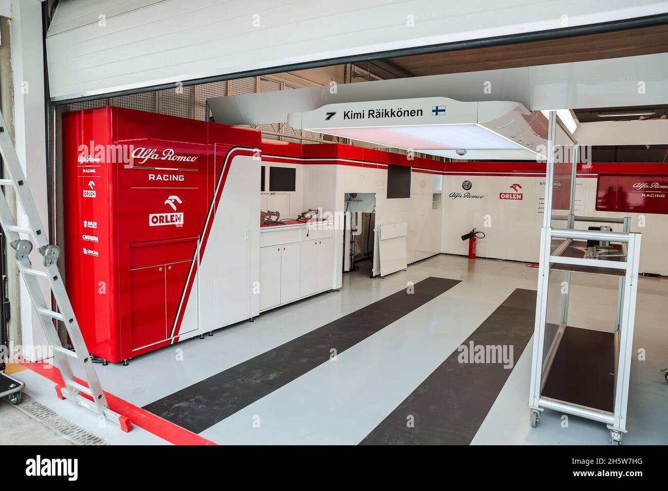 Empty pit garage for Kimi Raikkonen (FIN) Alfa Romeo Racing as freight ...