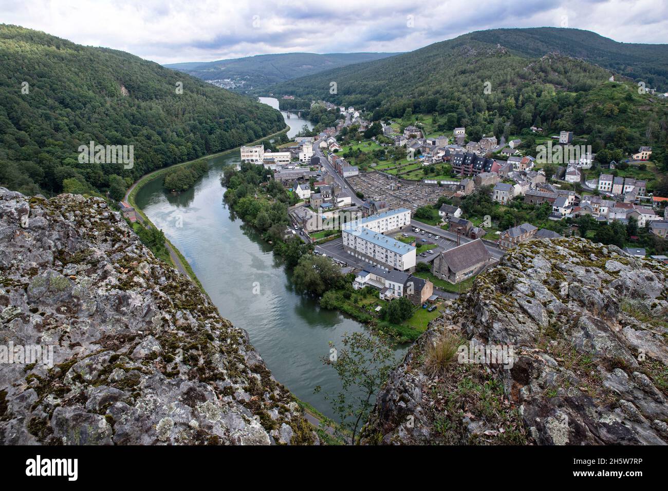 Aerial view of a town in the Ardennes crossed by the Meuse River in ...