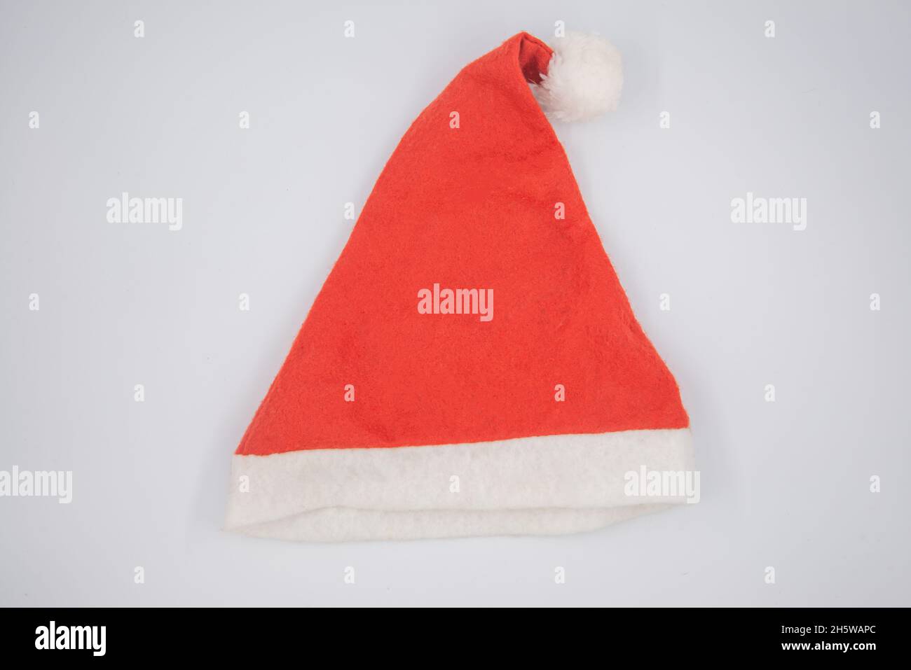Santa Claus red hat isolated on white background Stock Photo - Alamy