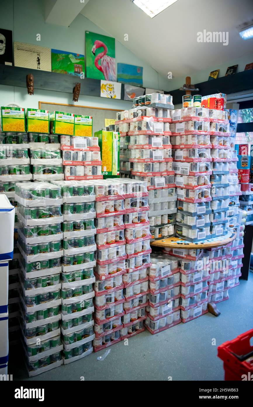 London Community Kitchen is a foodbank charity, tins in storage Stock ...