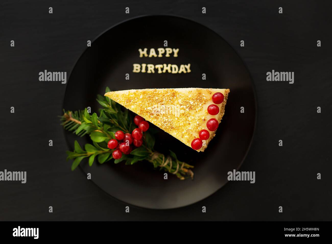 piece of cake decorated with the inscription happy birthday Stock Photo ...