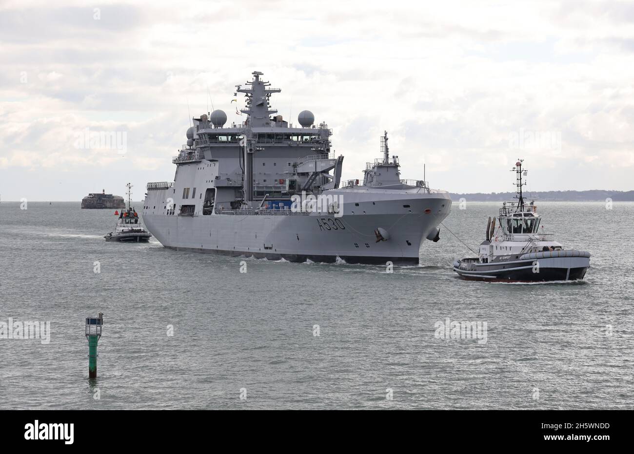 The tugs TEMPEST and INDULGENT escort the Royal Norwegian Navy ...