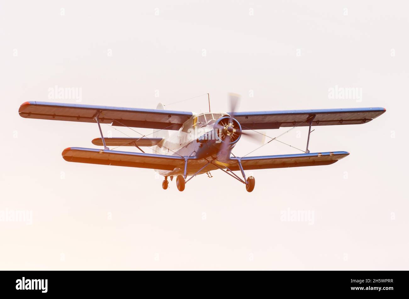 Old biplane, turboprop aircraft flight the sky Stock Photo - Alamy