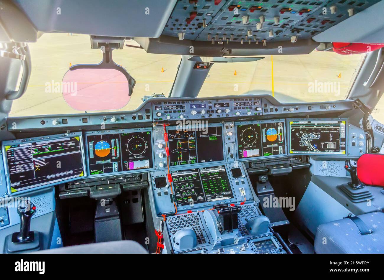 Cabin pilots aircraft view of the windshield, steering wheels, control ...
