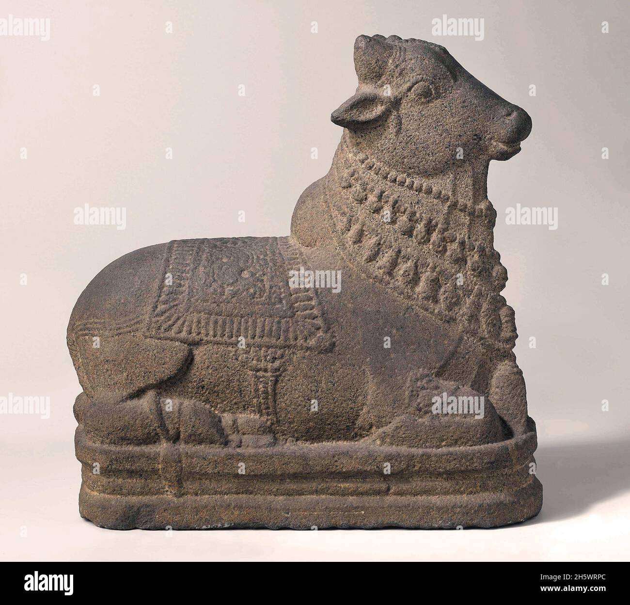 Hindu stone carving. Recumbent bull All the gods in the Hindu pantheon ...