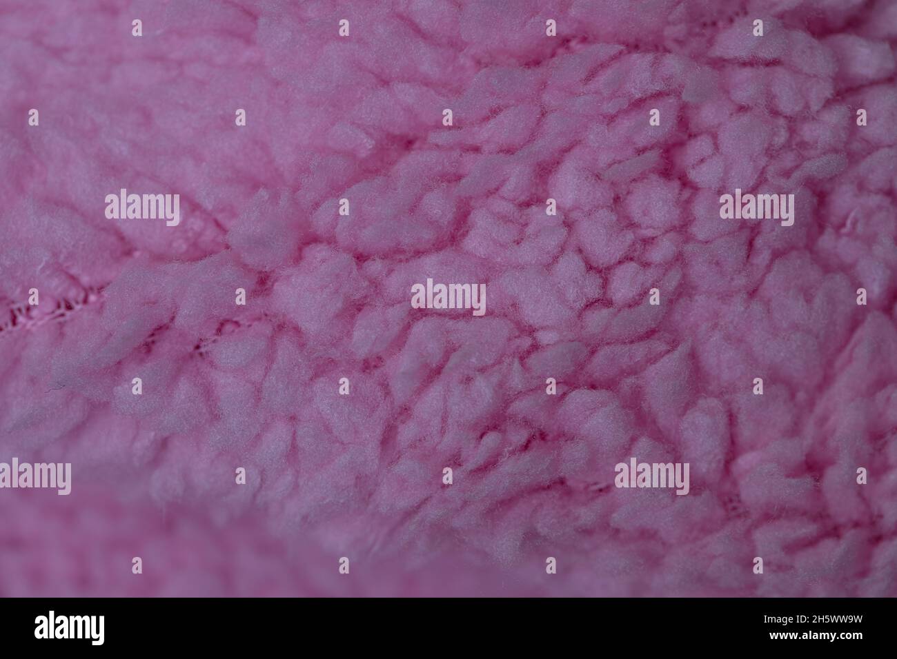 pink sherpa plush cloth textured background Stock Photo - Alamy