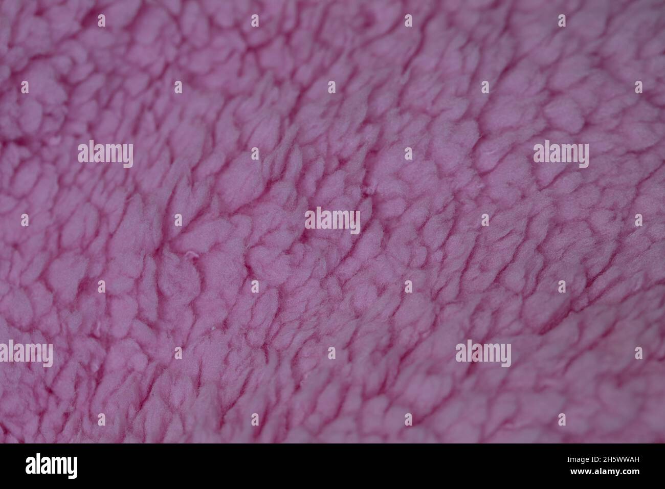 pink sherpa plush cloth textured background Stock Photo - Alamy