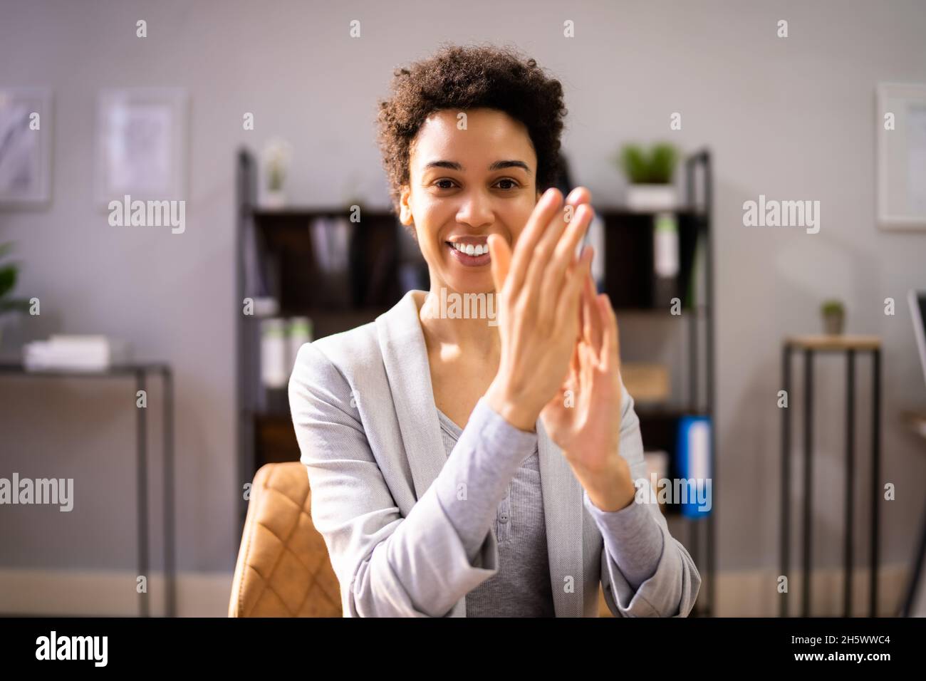 Woman Clapping In Online Video Conference Business Call Stock Photo - Alamy