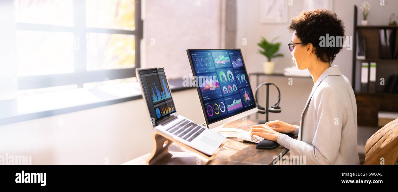 African American Business Data Analyst Woman Using Computer Stock Photo ...
