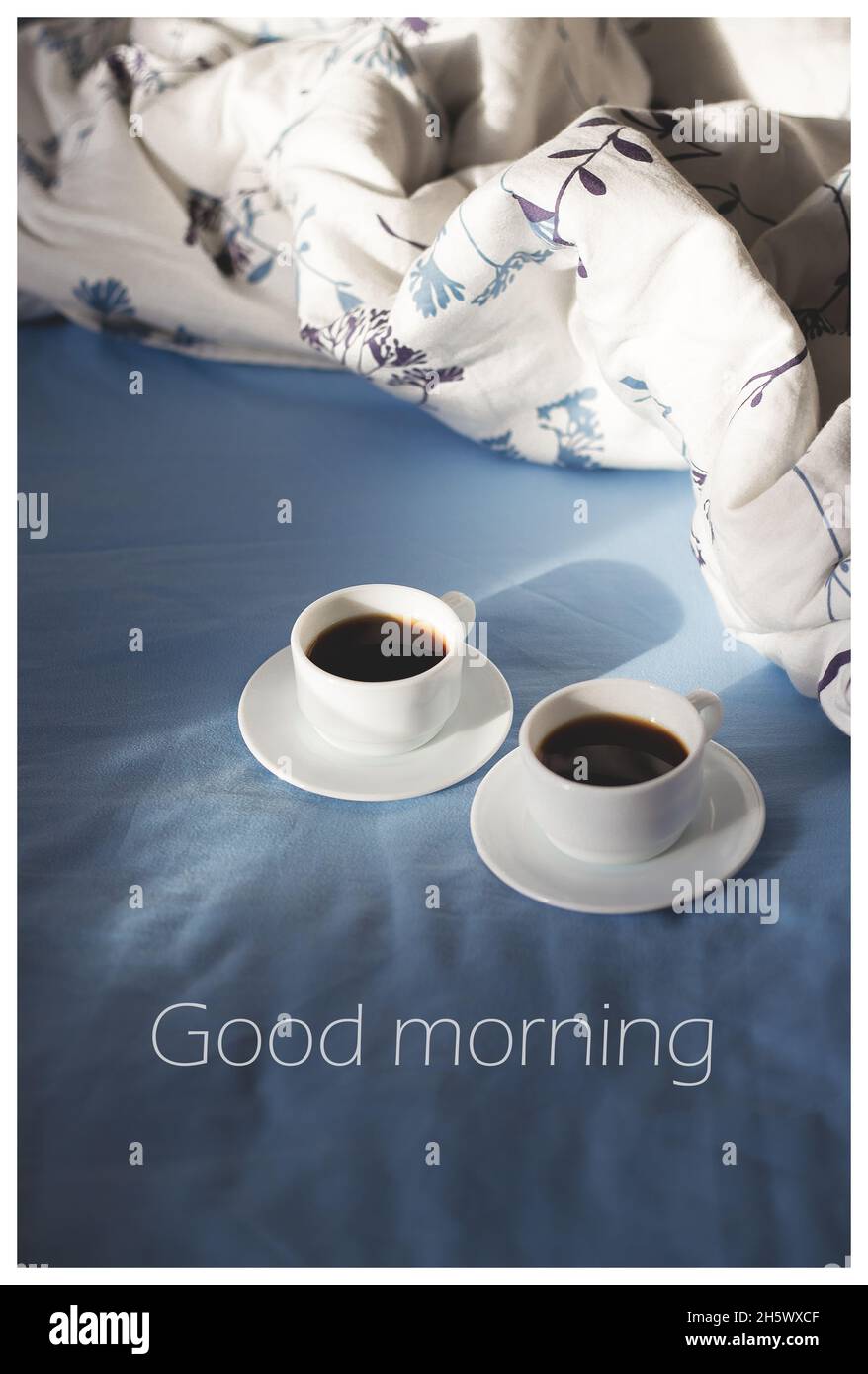 two cups of coffee are in bed, writing good morning Stock Photo - Alamy