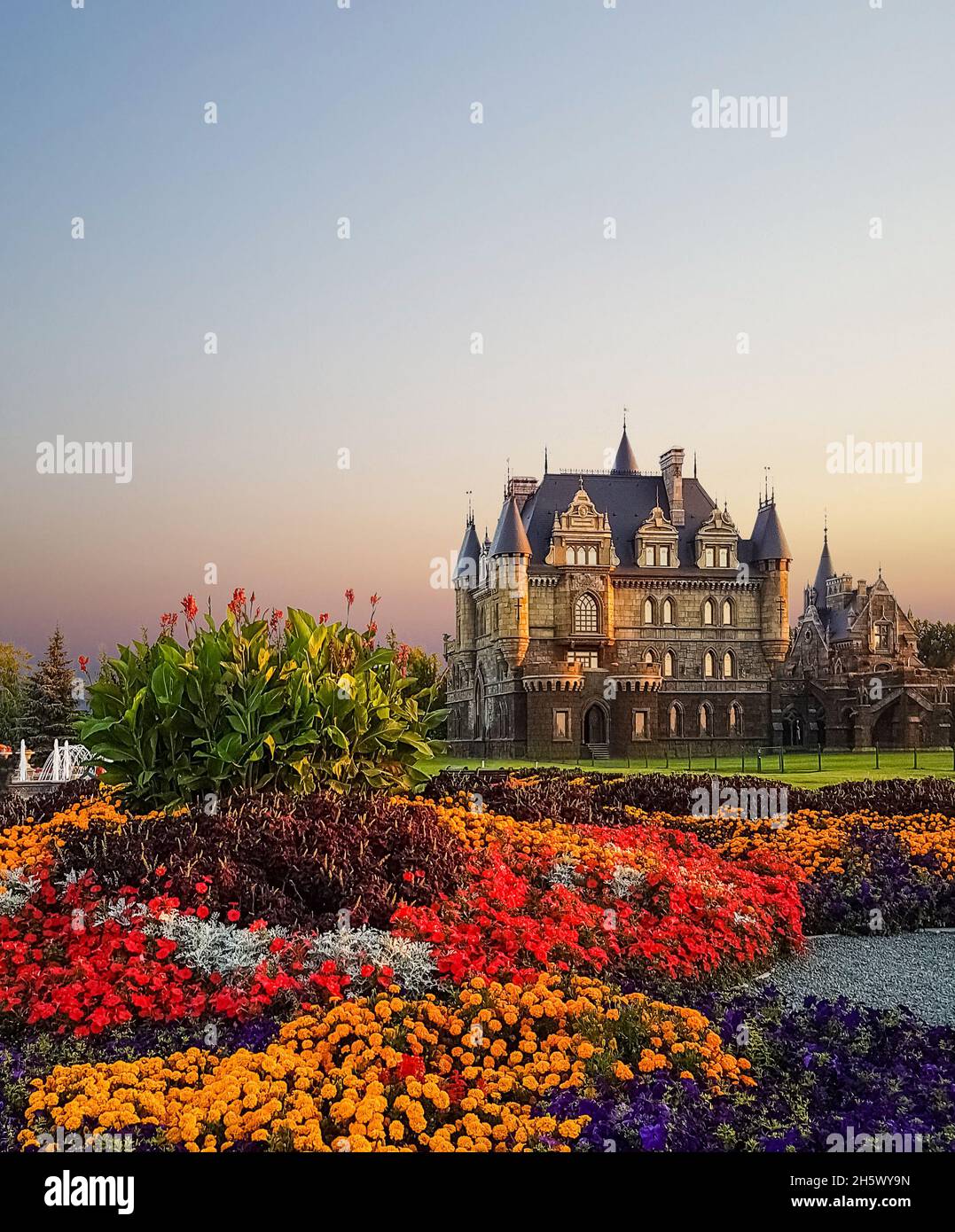 Beautiful gothic castle facade at sunset tme Stock Photo - Alamy