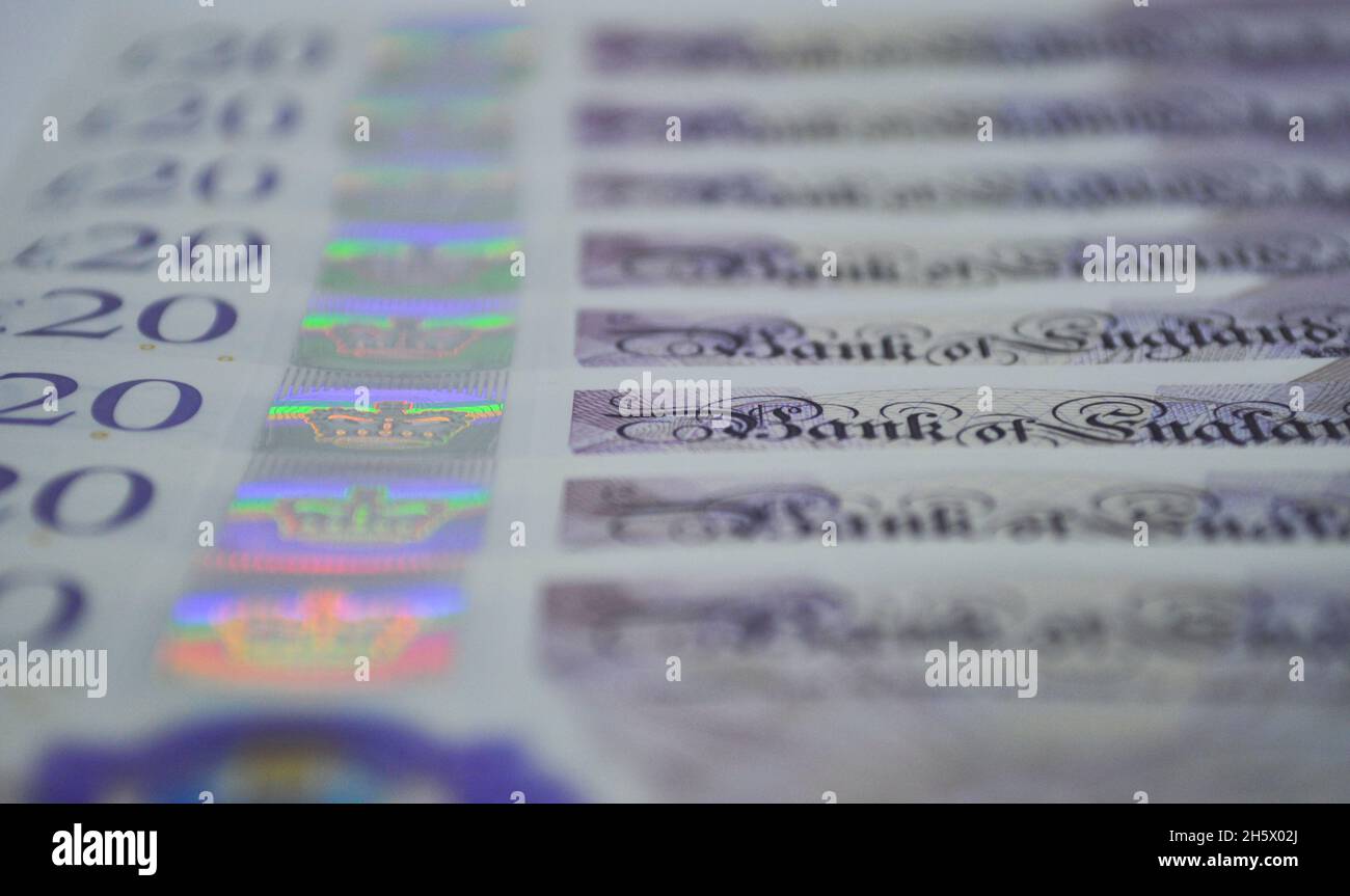 Multiple £20 Bank of England notes arranged with the crown hologram ...