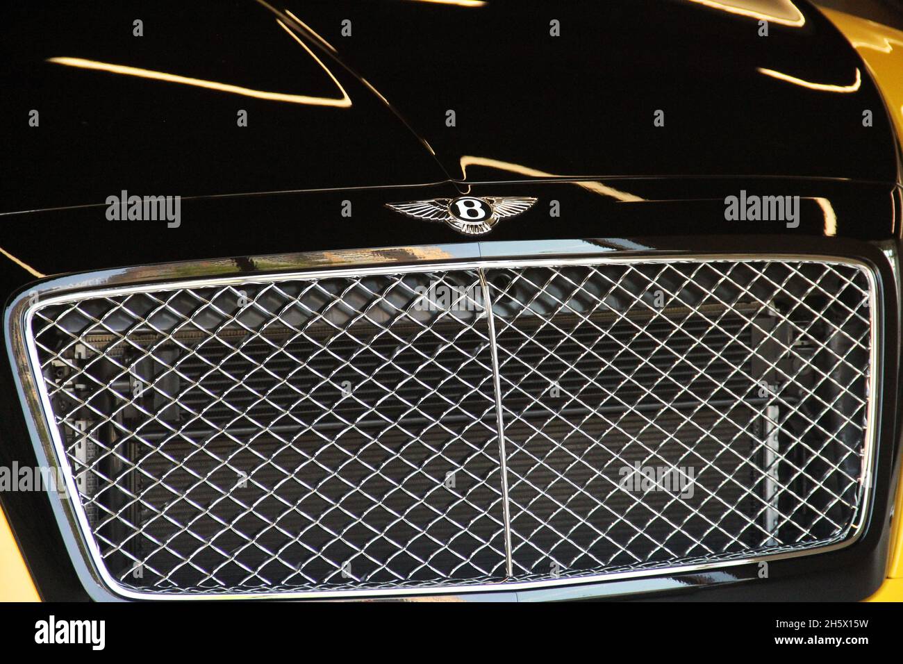 Kiev, Ukraine - May 3, 2019: Yellow Bentley Bentayga Mansory in the ...