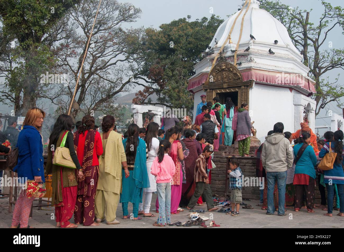 Hindu worshippers wait their turn at the 17th-century Bhindya Basini ...
