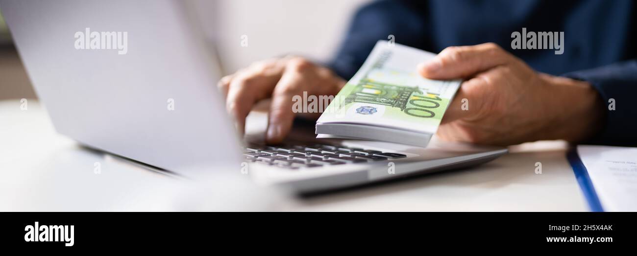 Rich man computer hi-res stock photography and images - Alamy