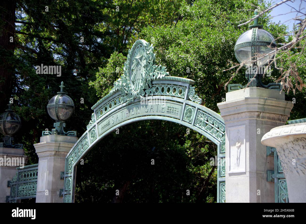 Sather Gate surrounded by greenery under the sunlight in Berkeley ...