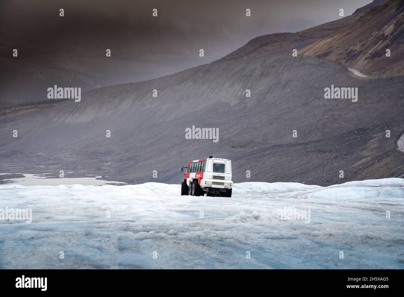Banff Alberta Canada, September 27 2021: An Ice Explorer bus with special tires carries a group ...