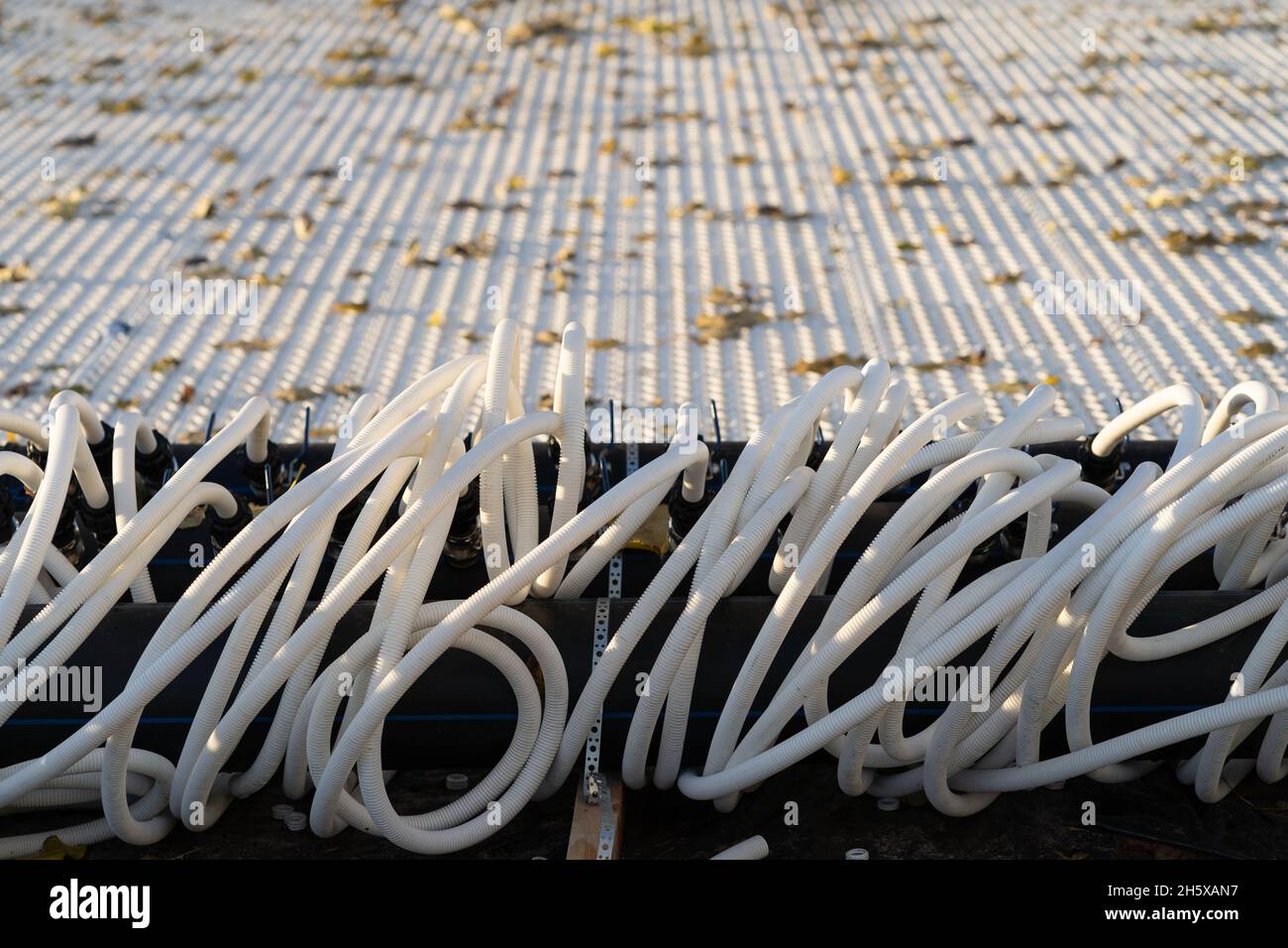 Urban ice rink piping system. Preparation of icy surface for winter ...