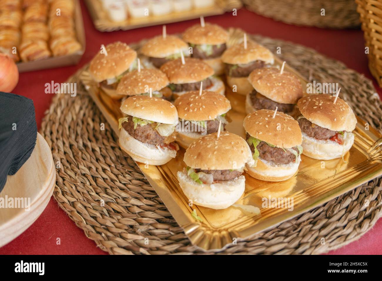 appetizer of small tiny burgers Stock Photo - Alamy