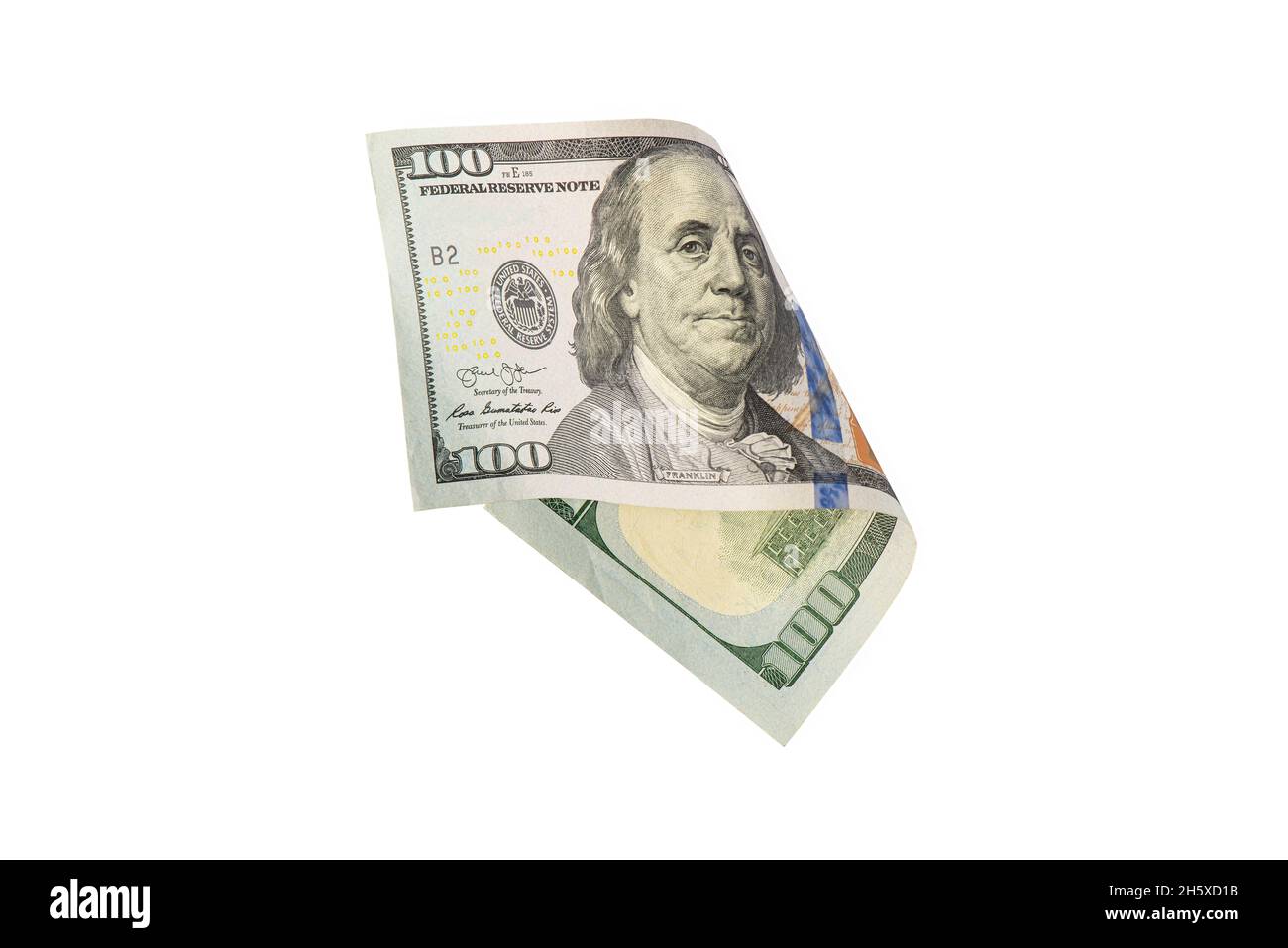 Isolate on white hundred dollar bills. American money folded in half ...