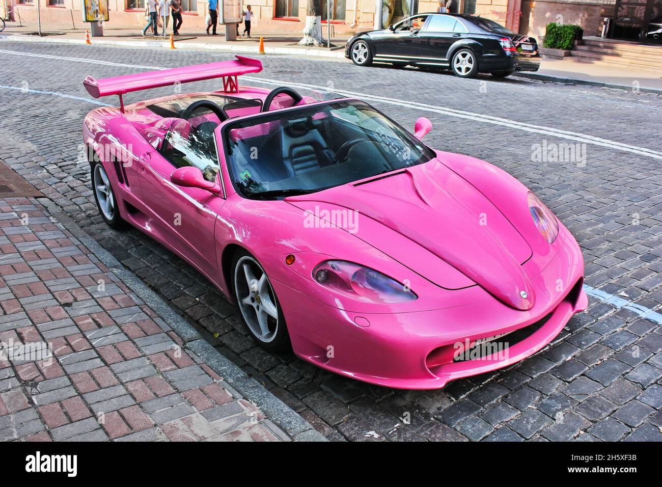 Kiev, Ukraine - June 1, 2013: Pink exclusive supercar Ferrari Modena ...