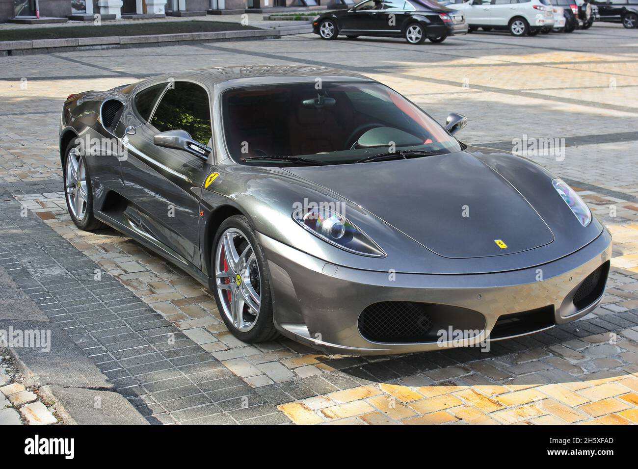 Kiev, Ukraine - June 9, 2013: Grey Ferrari F430 in the city Stock Photo ...