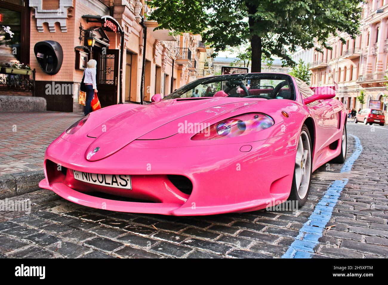 Kiev, Ukraine - June 1, 2013: Pink exclusive supercar Ferrari Modena ...