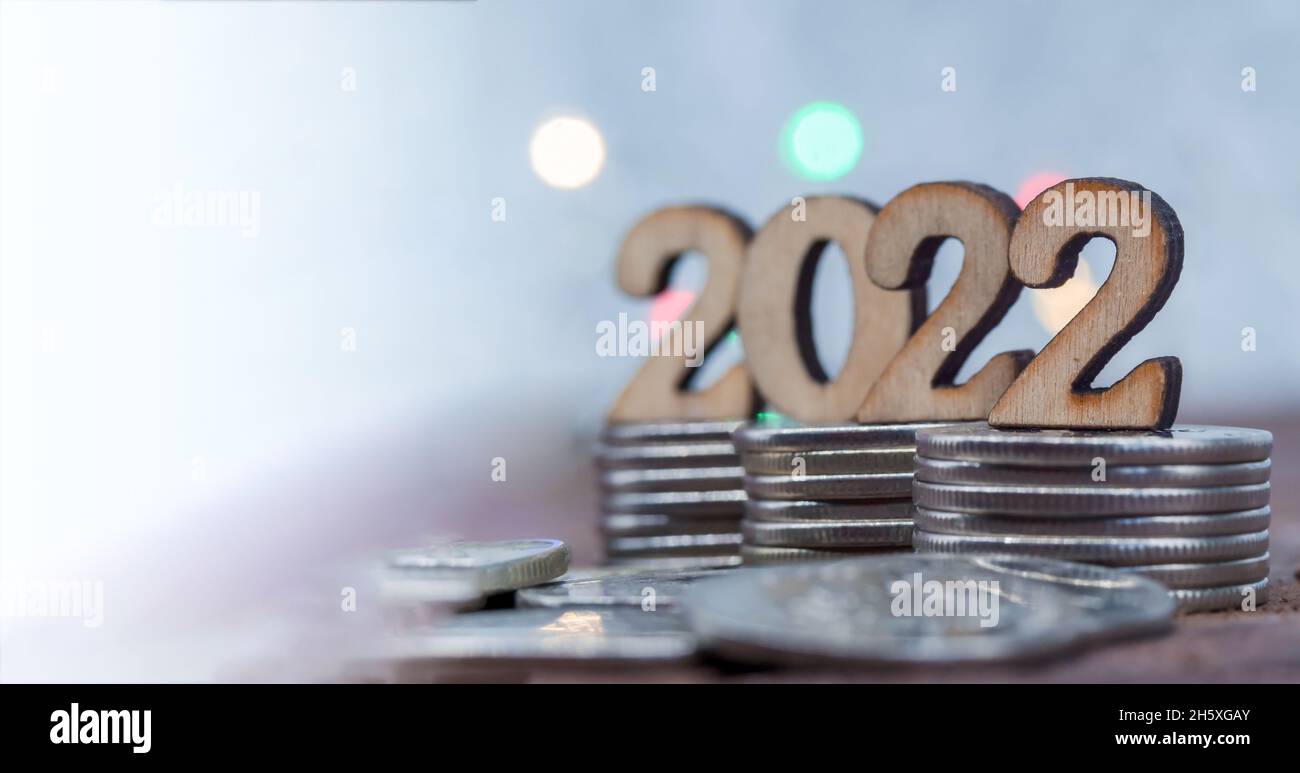 Coins and Figures 2022. Banner 2022. Money stacked in columns Stock ...