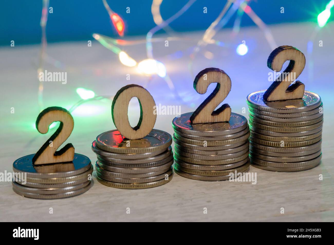 Coins and Figures 2022. Banner 2022. Money stacked in columns Stock ...
