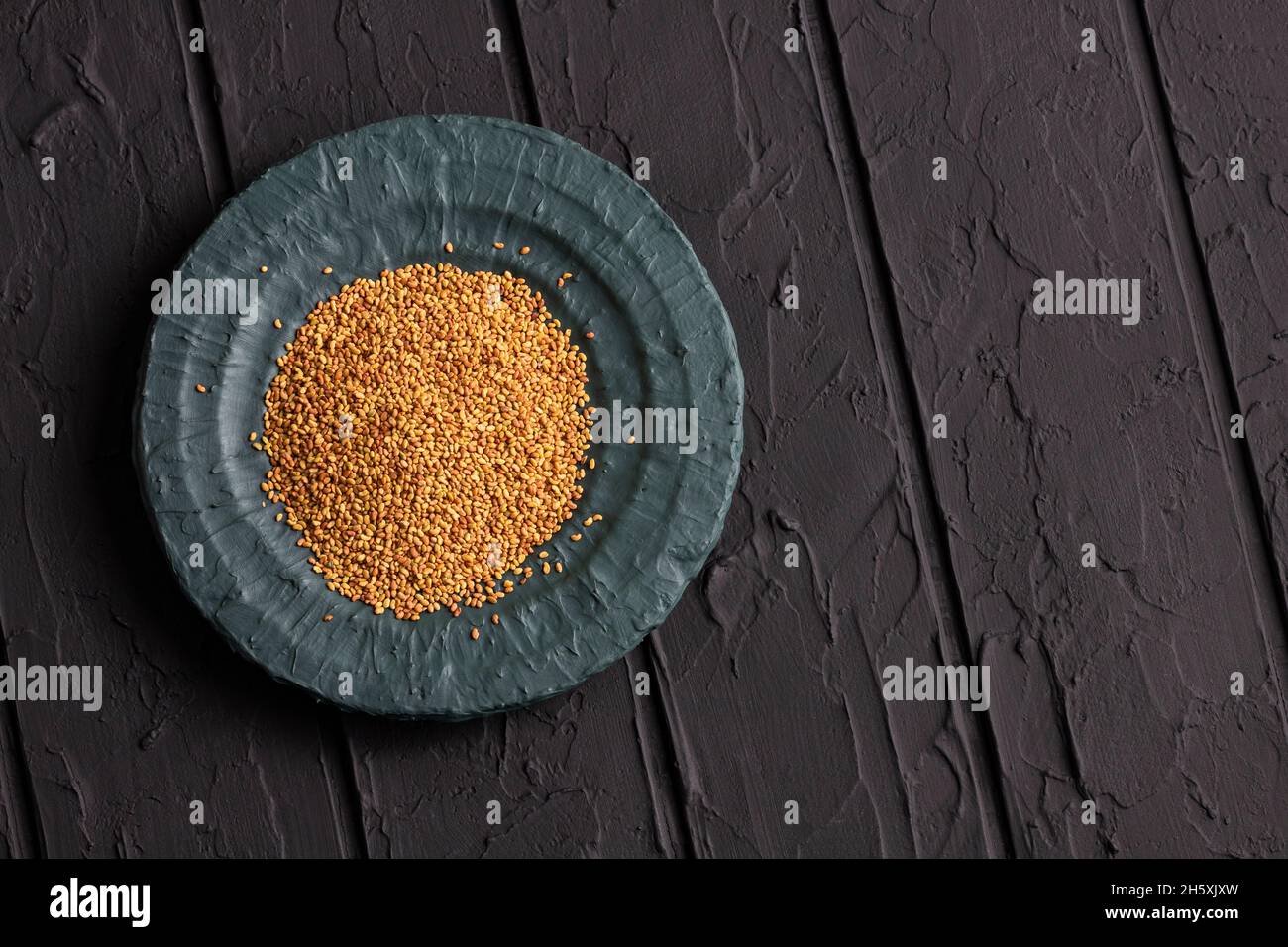 Organic alfalfa seeds in the bowl - Medicago sativa Stock Photo - Alamy