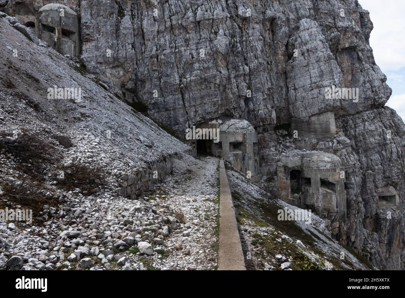 Rocky road to the bunker from the 2nd World war under a high cliff ...
