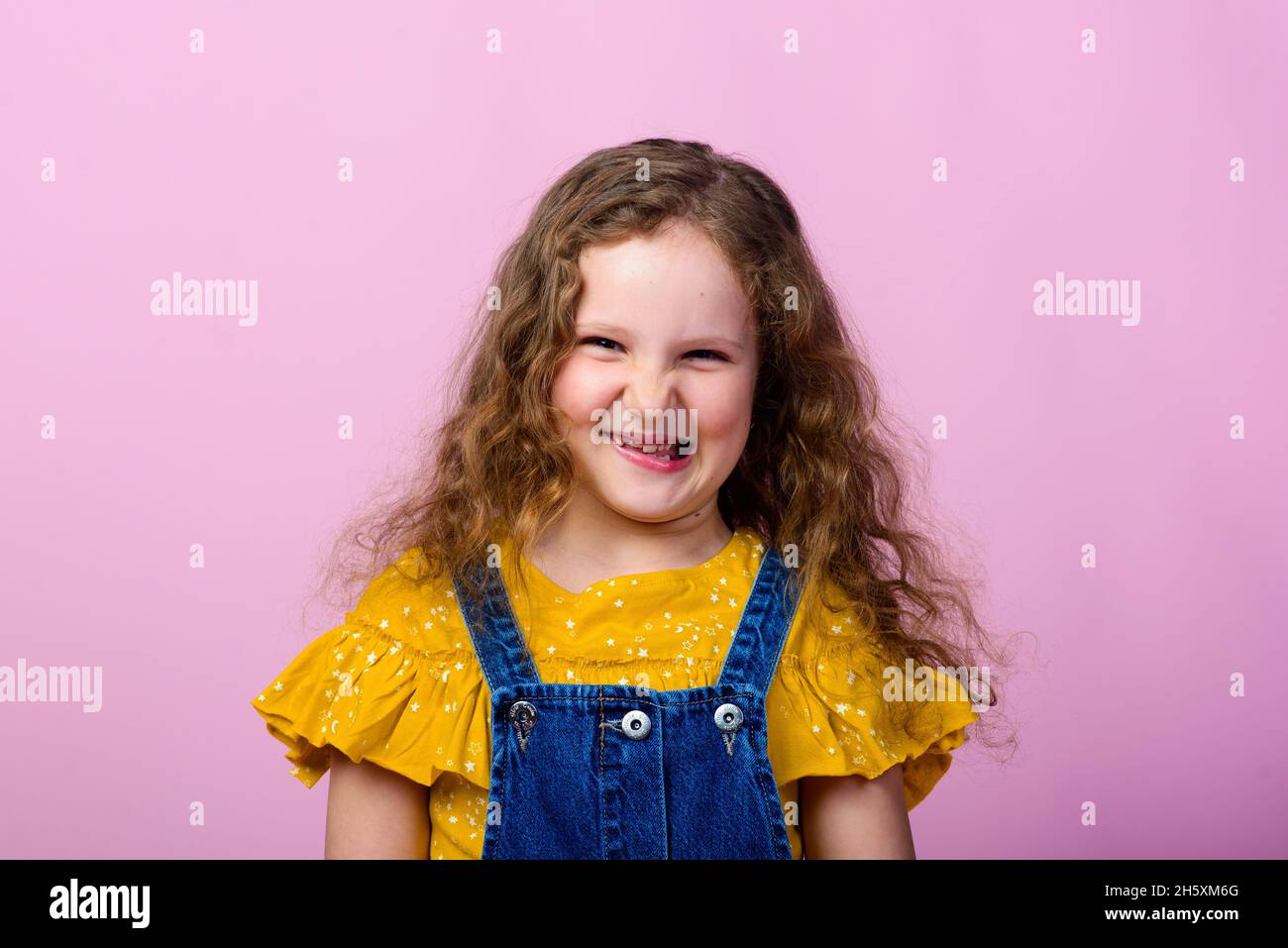 Happy carefree child emotions. Energetic joyful adorable little girl ...
