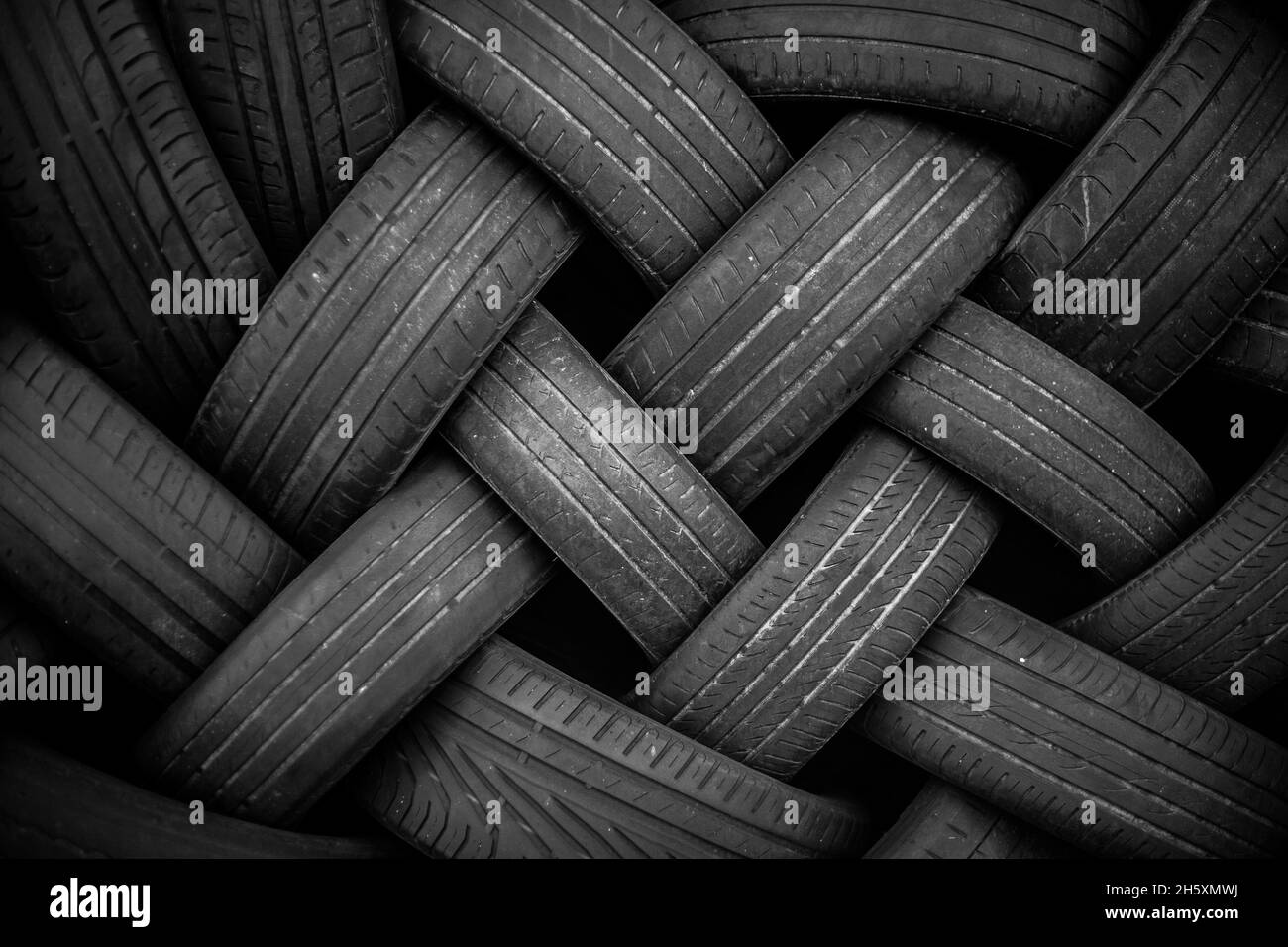 Old used car tires. A pile of black tires, abstract background Stock ...