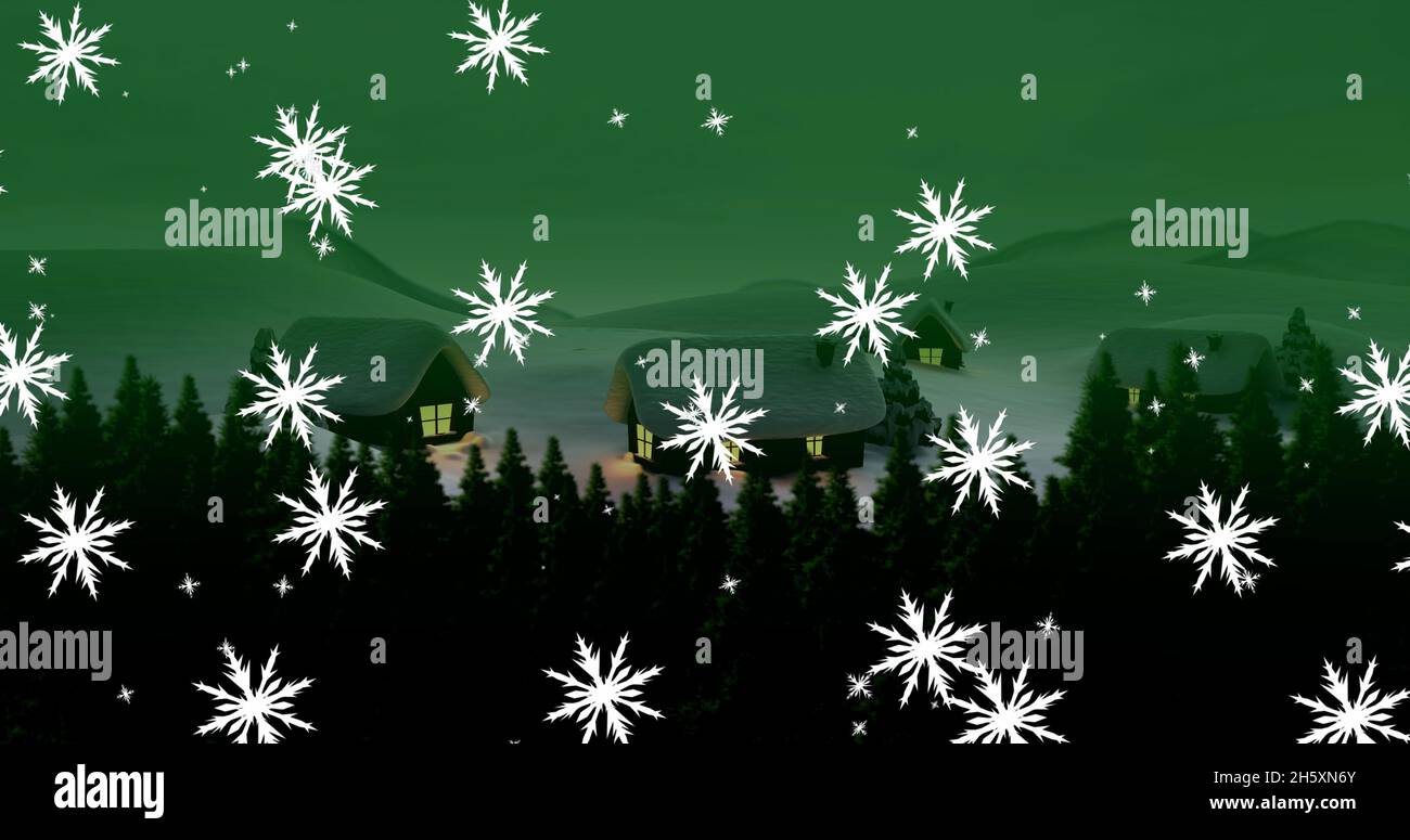 Image of snow falling over christmas scenery with houses and trees ...