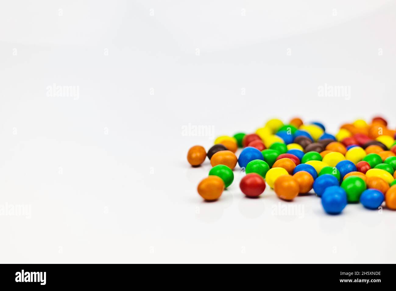 Multi-colored candy - Peanut Stock Photo - Alamy