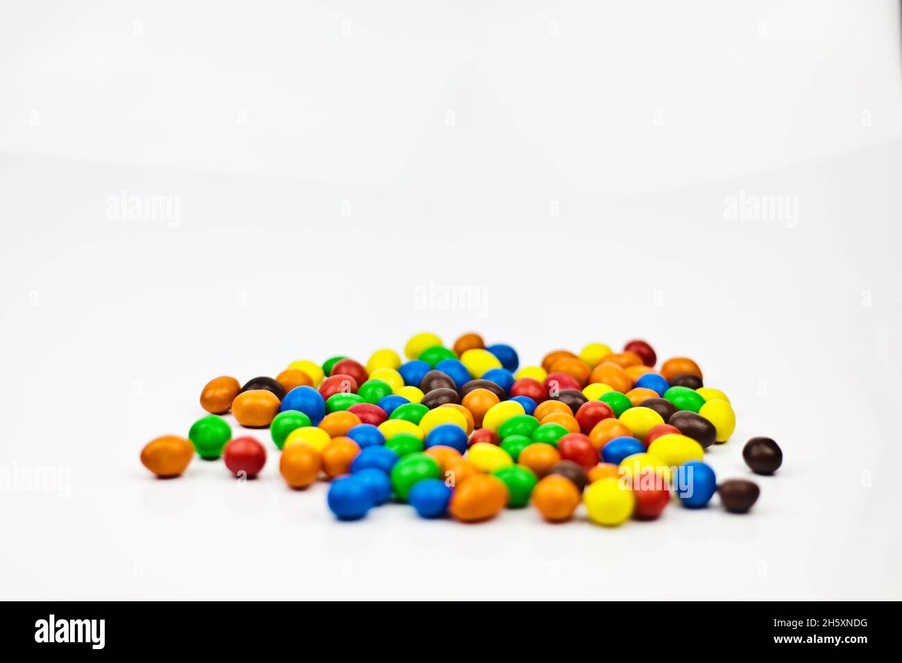 Multi-colored candy - Peanut Stock Photo - Alamy