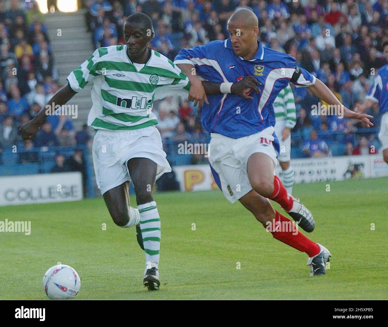 PORTSMOUTH V CELTIC MOHAMMED SYLLA TANGLES WITH NIGEL QUASHIE. PIC MIKE ...