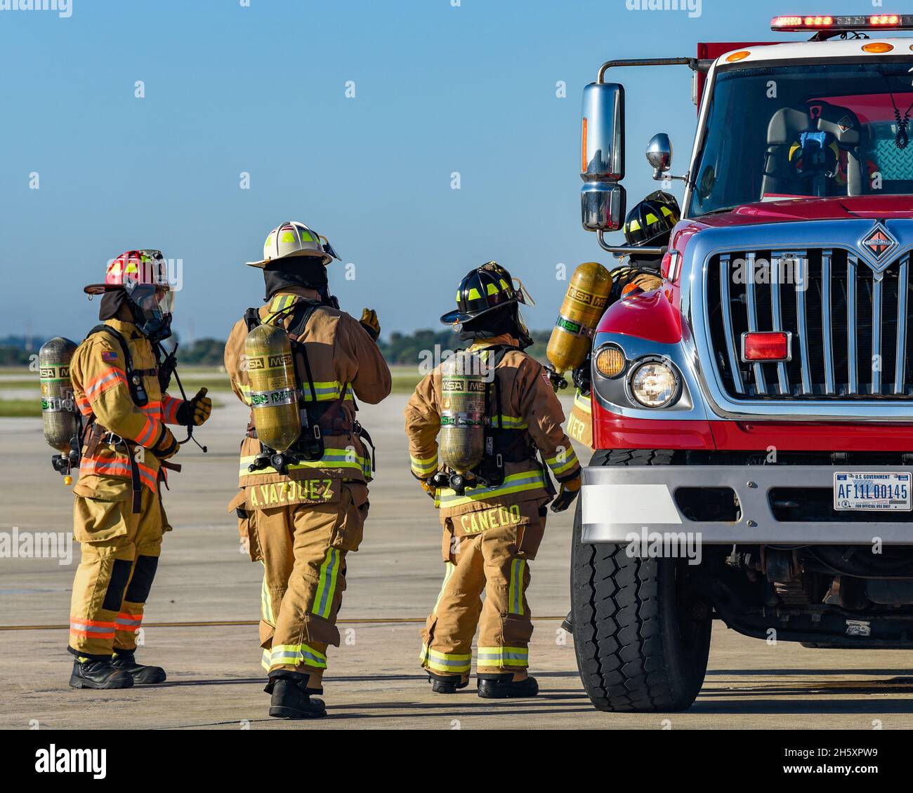 Firefighters assigned to the Patrick Space Force Base Fire Department ...