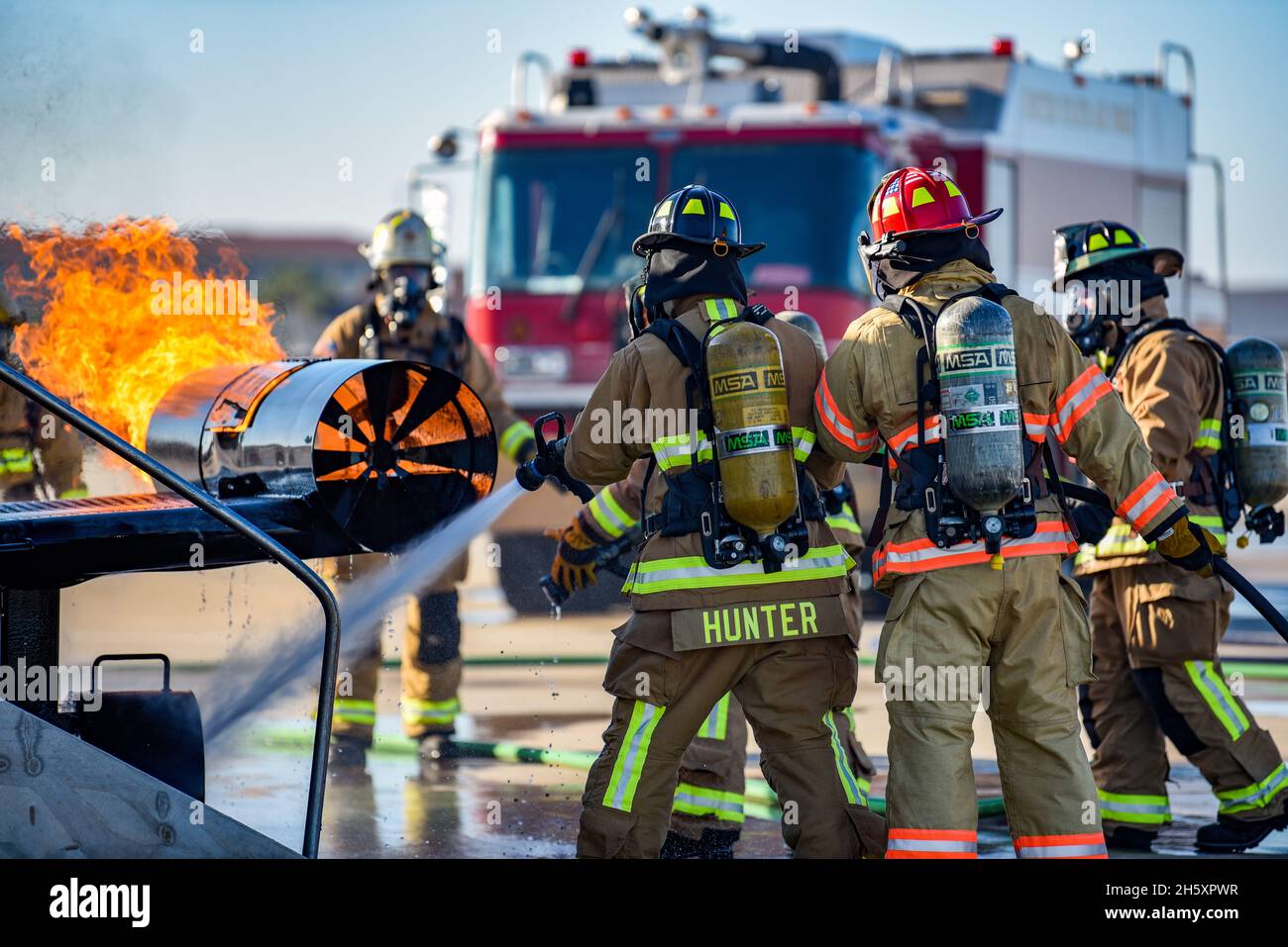 Firefighters assigned to the Patrick Space Force Base Fire Department ...